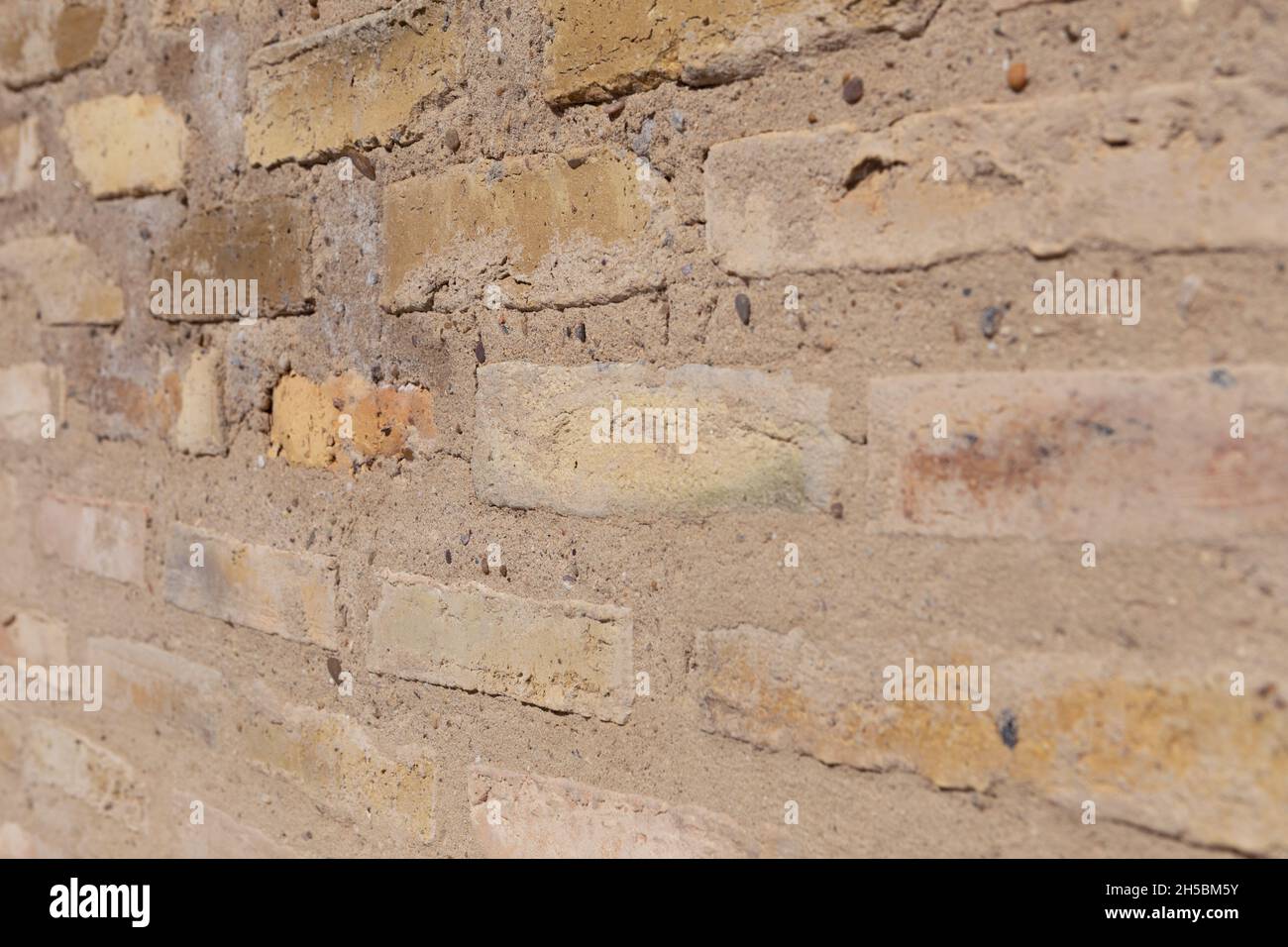 Brown misty brick wall for background or texture Stock Photo - Alamy