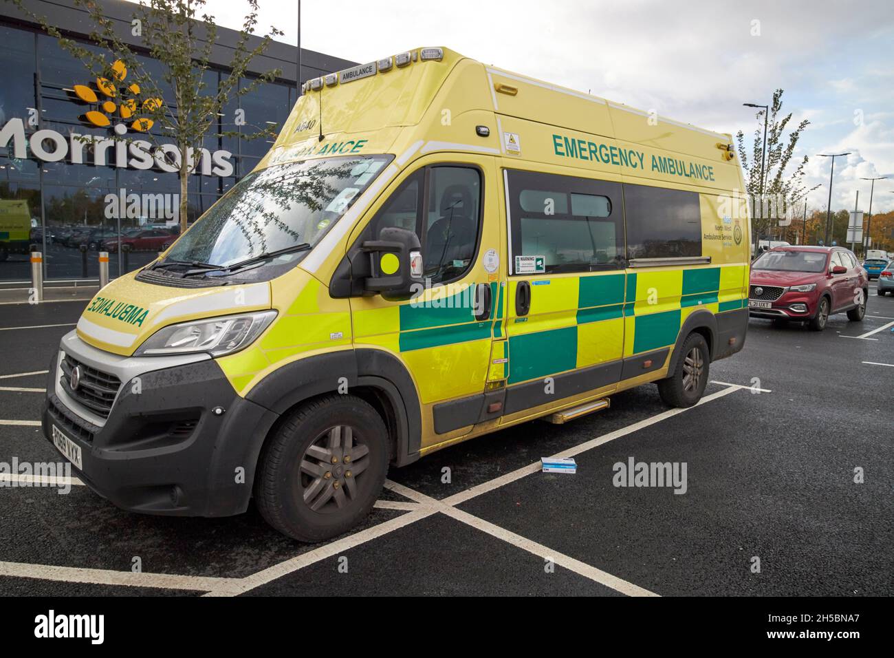 north west ambulance service emergency ambulance outside a supermarket ...