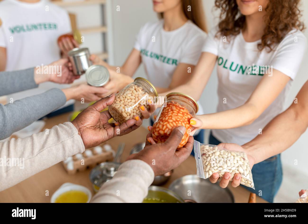 Hands Giving Out Food