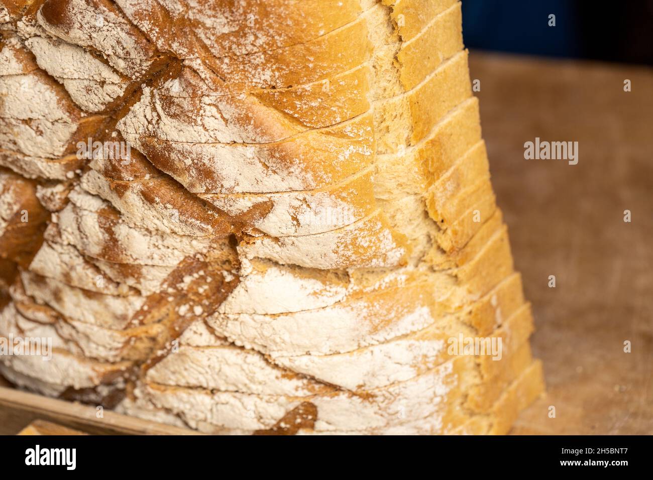 A large loaf of white bread, sliced Stock Photo - Alamy