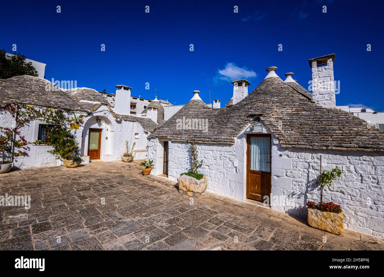 Famous landmark in Alberobello in Italy - the historic Trulli houses ...