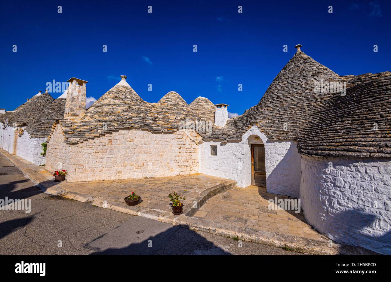 Famous landmark in Alberobello in Italy - the historic Trulli houses ...