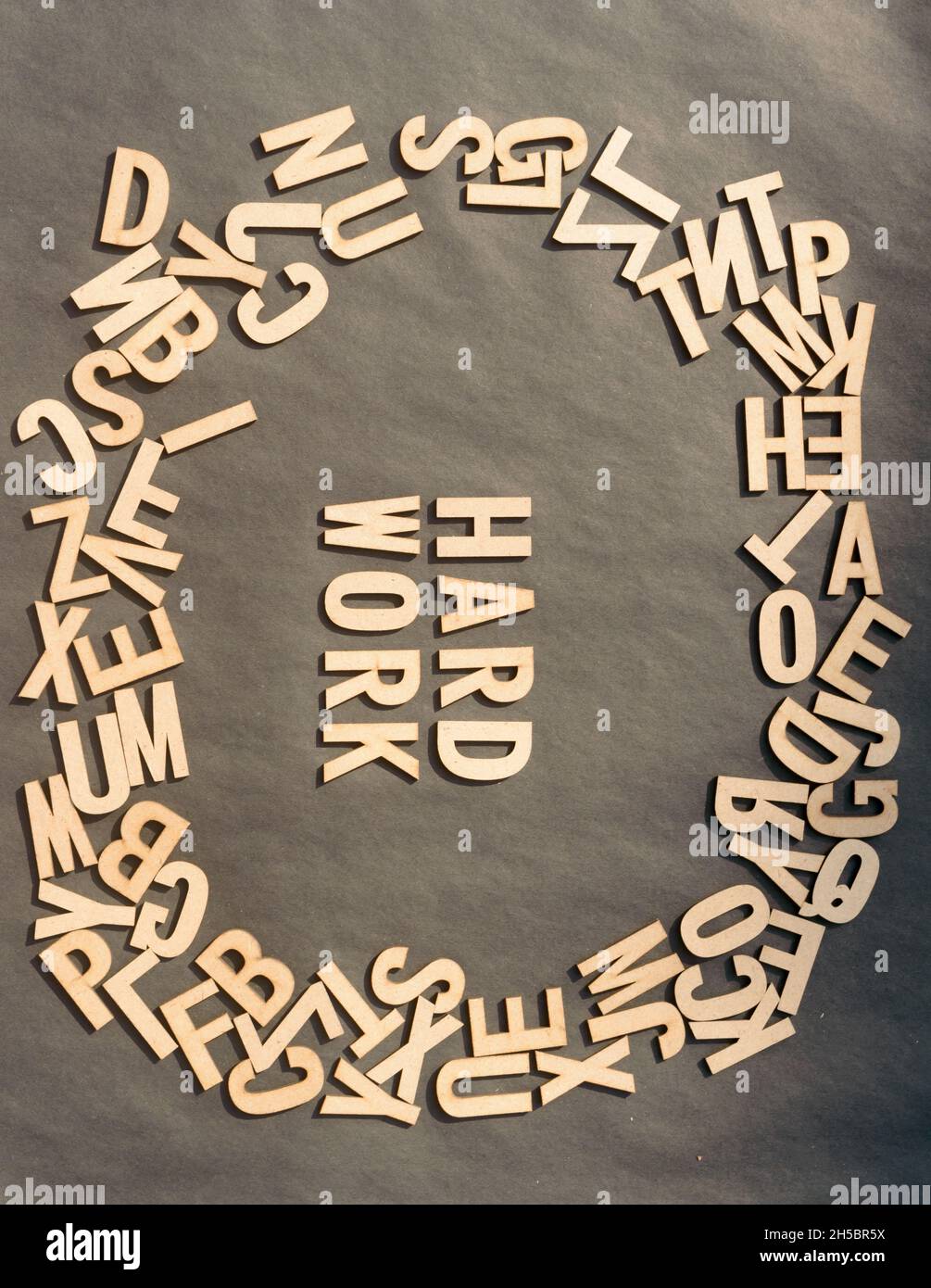 Word Hard Work In Wooden Cube Alphabet Letters Top View On A rustic ...