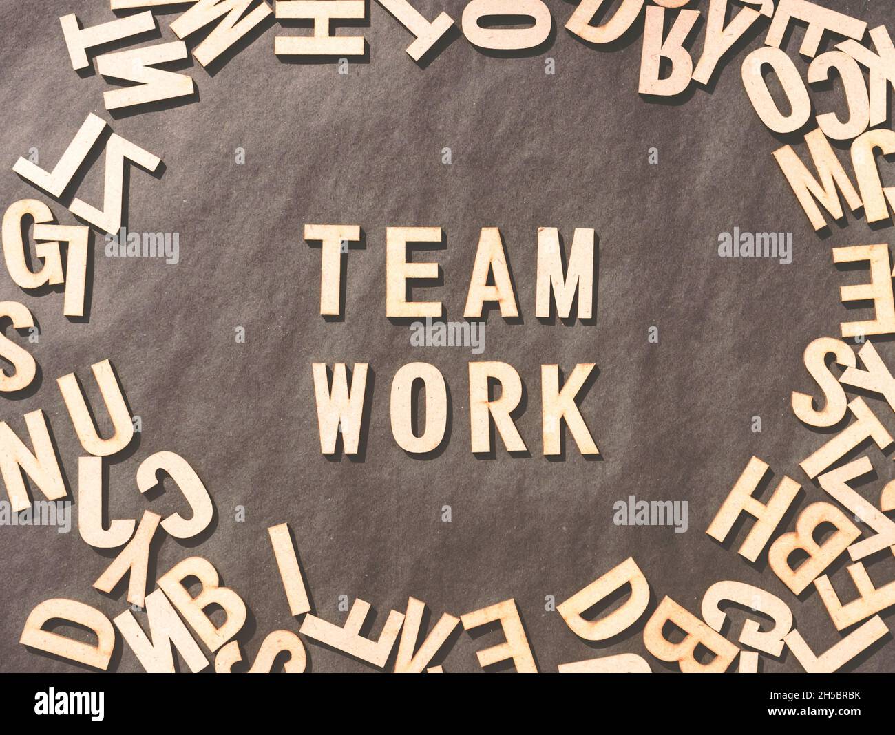 Team Work Word In Wooden Cube Alphabet Letters Top View On A rustic ...