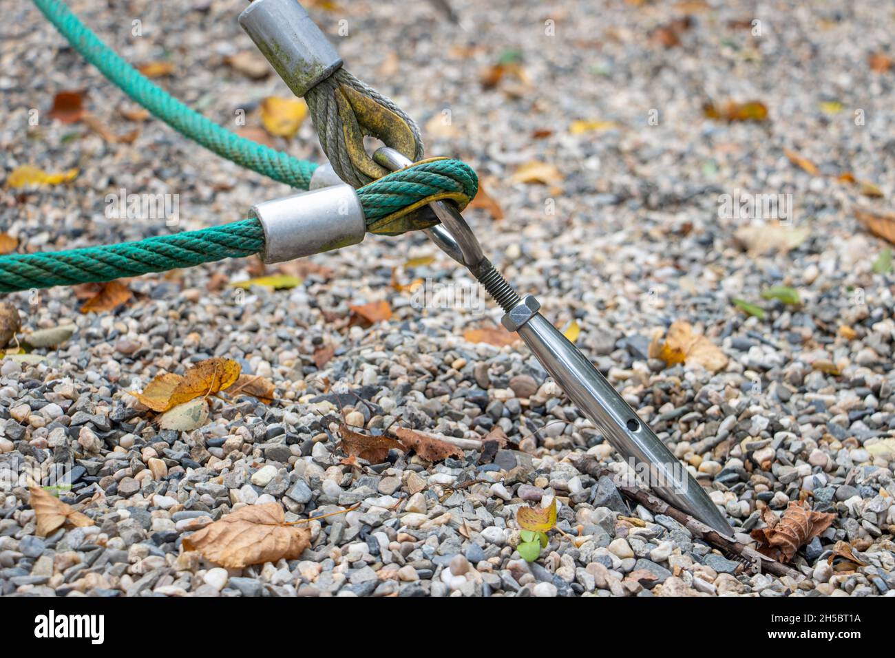 A construction of ropes mounted in the ground with gravel Stock Photo ...