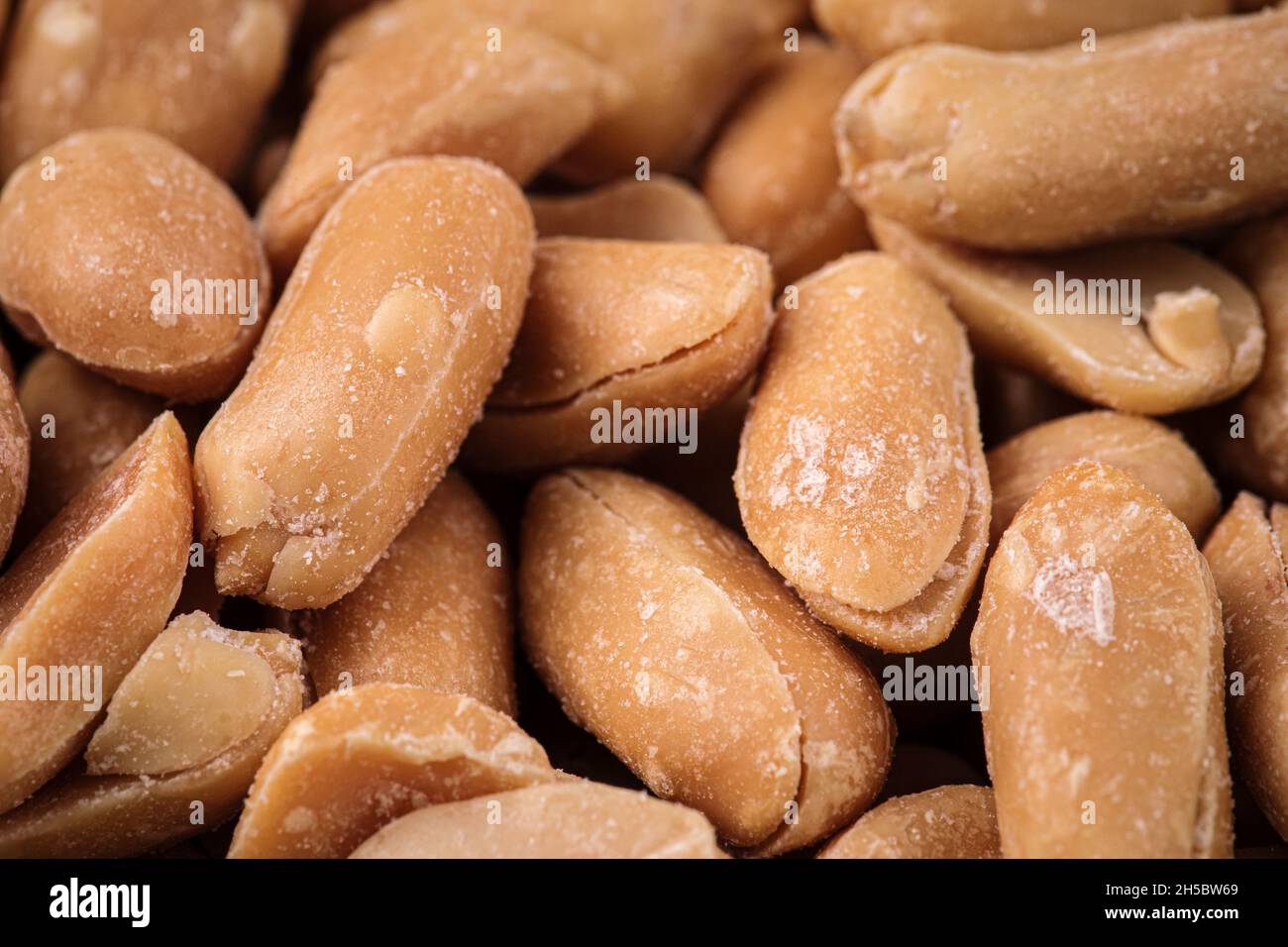Closeup on peanuts background texture Stock Photo - Alamy
