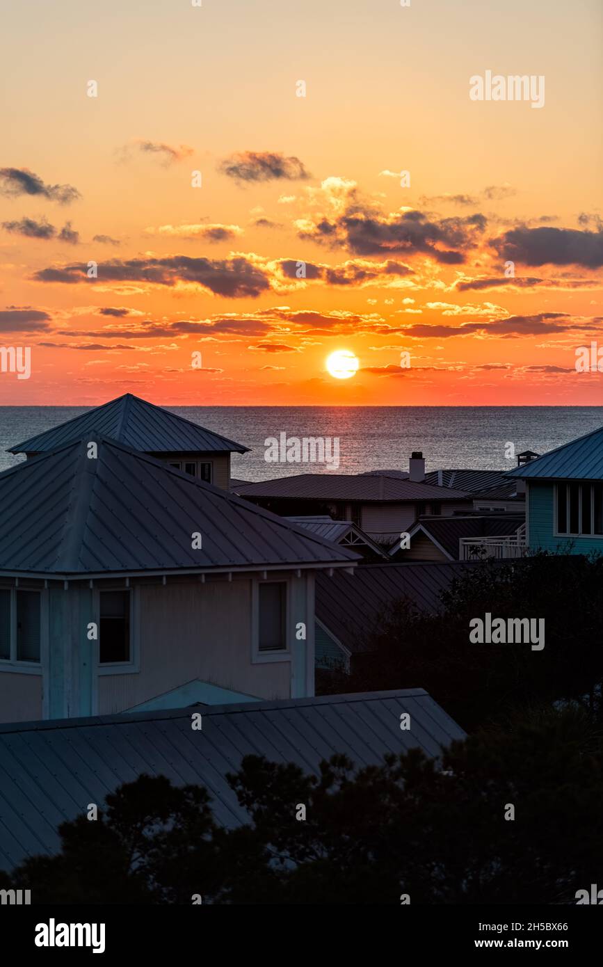 Aerial vertical view on colorful yellow sunset sun with ocean landscape ...
