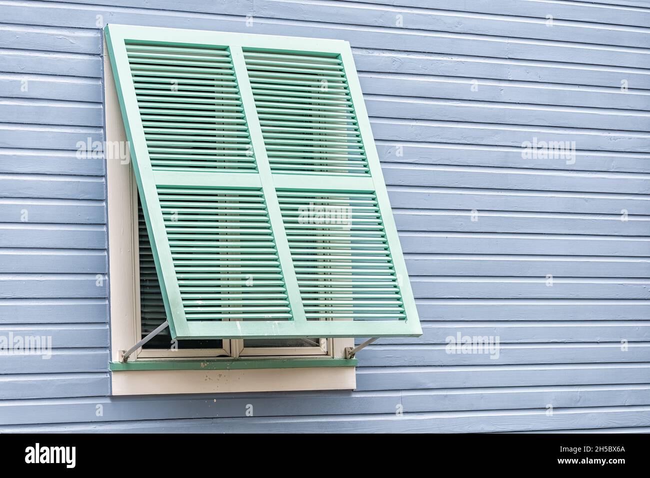 Pastel turquoise blue purple painted colorful hurricane open window ...