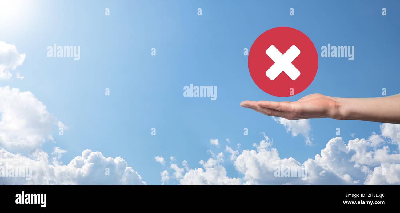 Hand holds icon,cancellation symbol,cancel icon.Cross mark flat red ...