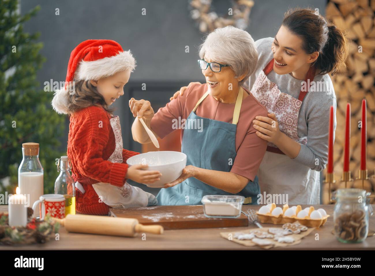 Merry Christmas and Happy Holidays. Family preparation holiday food ...