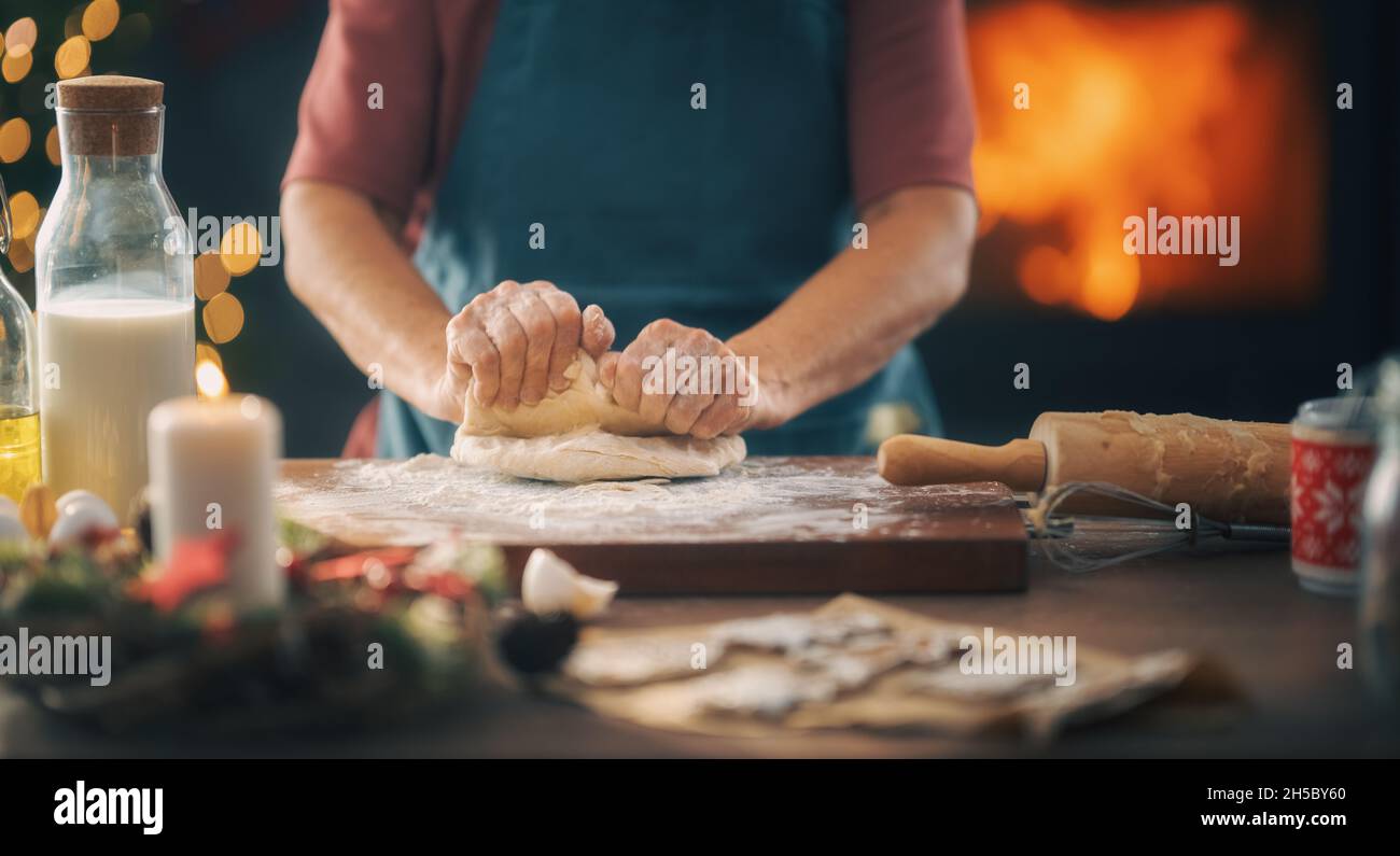 Senior woman baking christmas cookies hi-res stock photography and ...