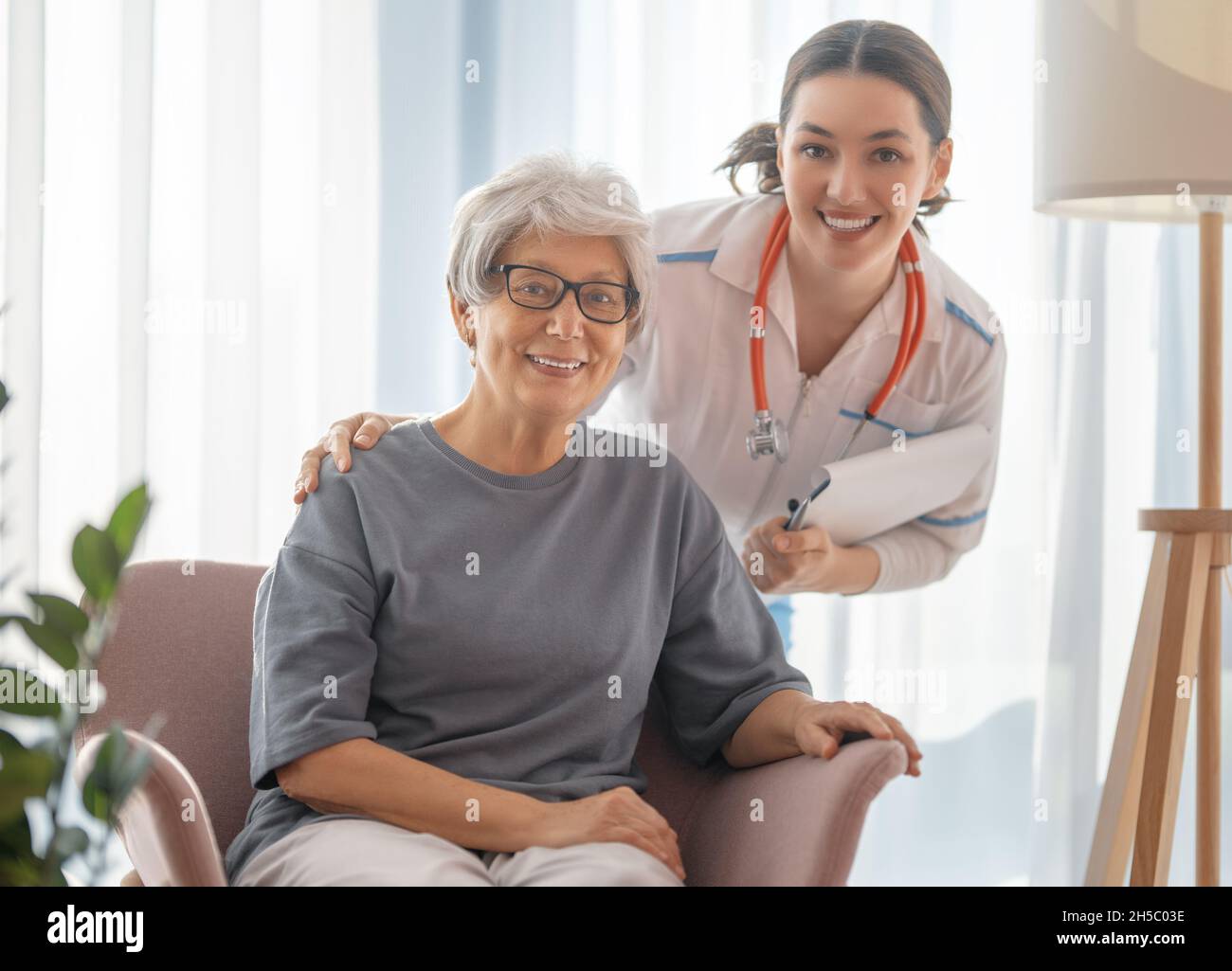 Female patient listening to a doctor in hospital Stock Photo - Alamy
