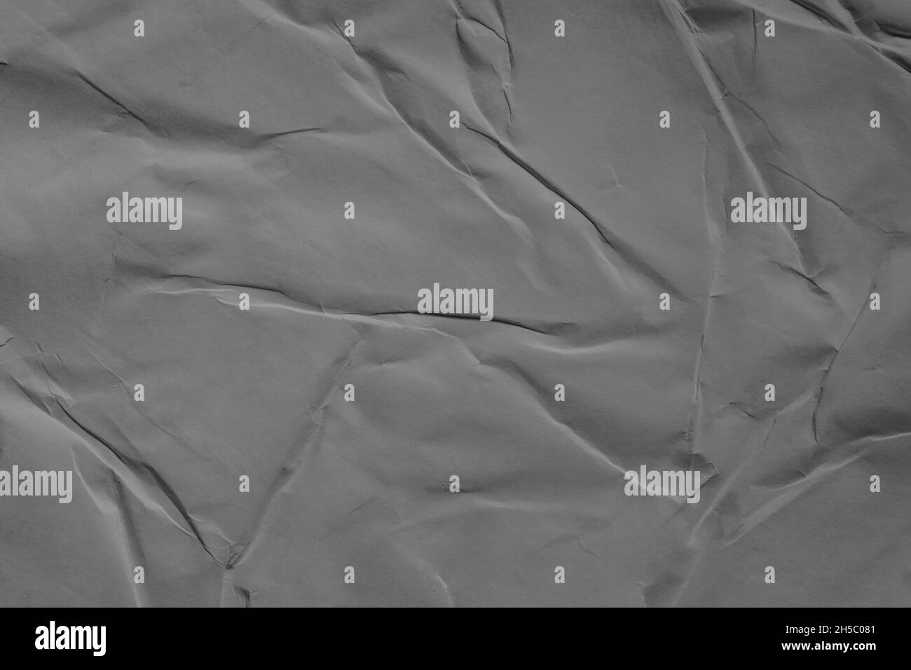 Medium gray crumpled paper texture background Stock Photo - Alamy