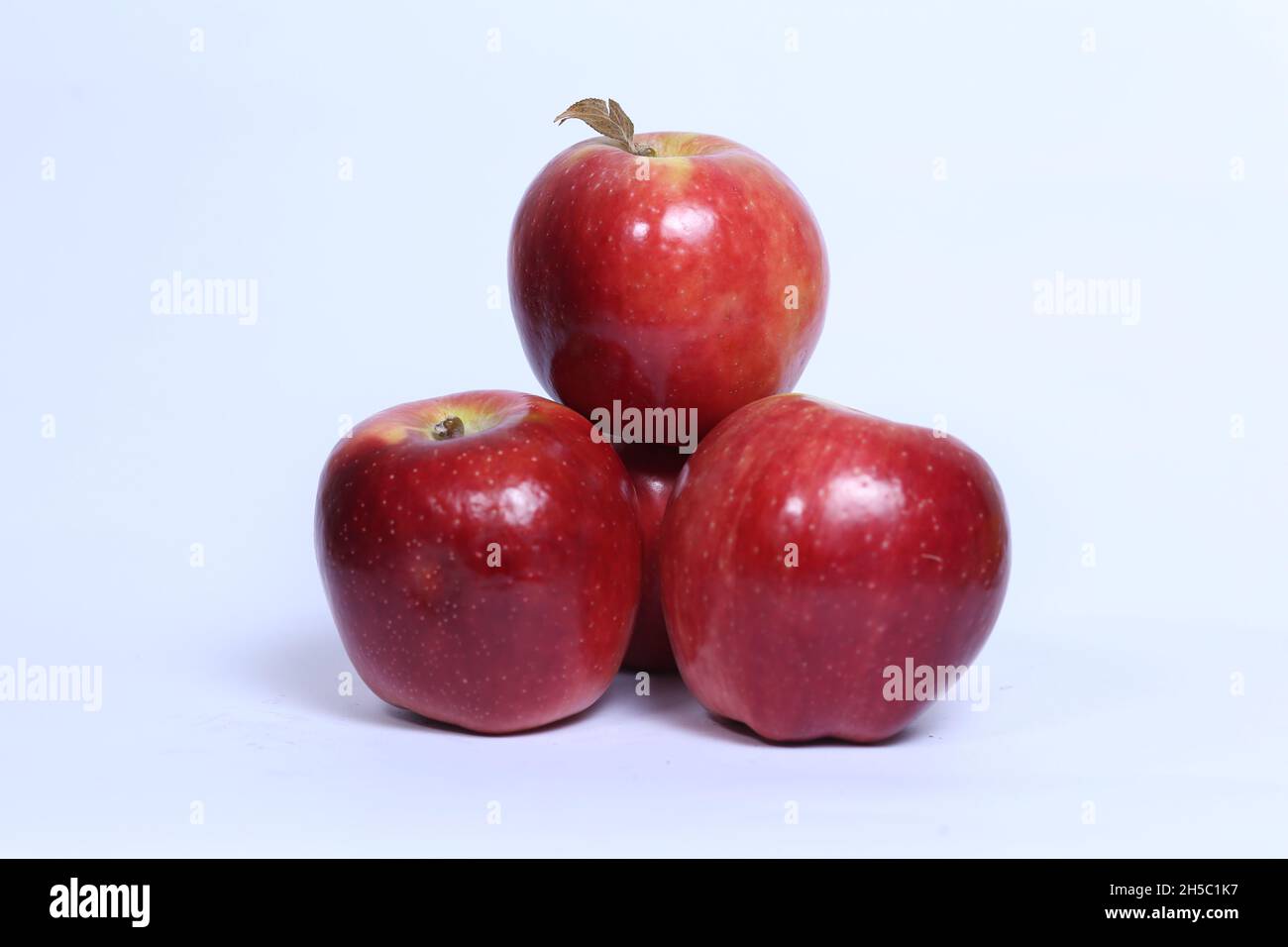 Red apples isolated on white background Stock Photo - Alamy
