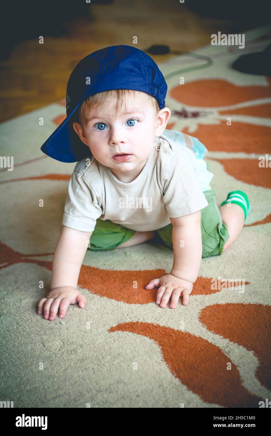 One year old baby boy stare straight to camera Stock Photo - Alamy