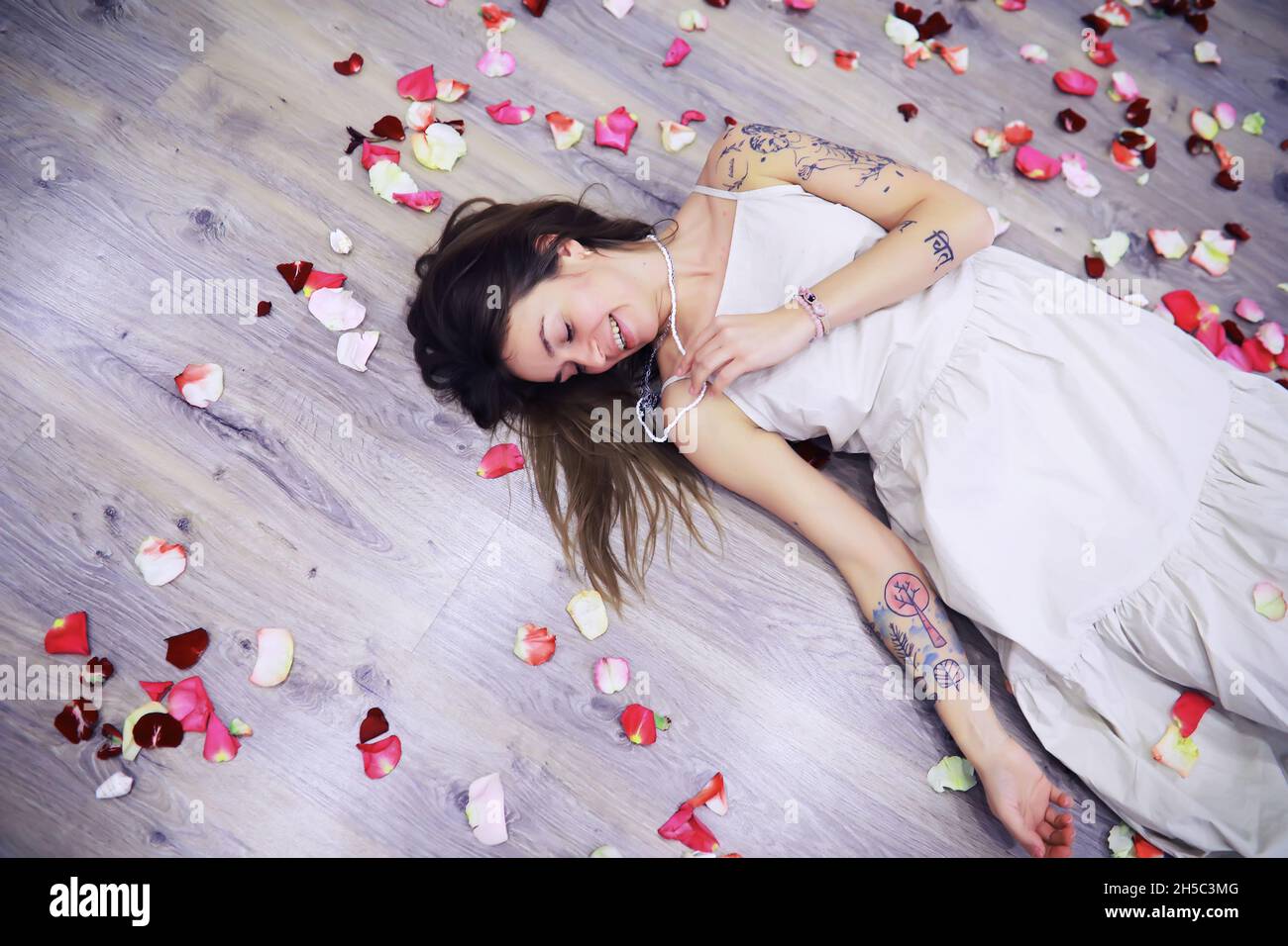 Relaxed serene pretty young woman at home, happy calm lady dream enjoy ...