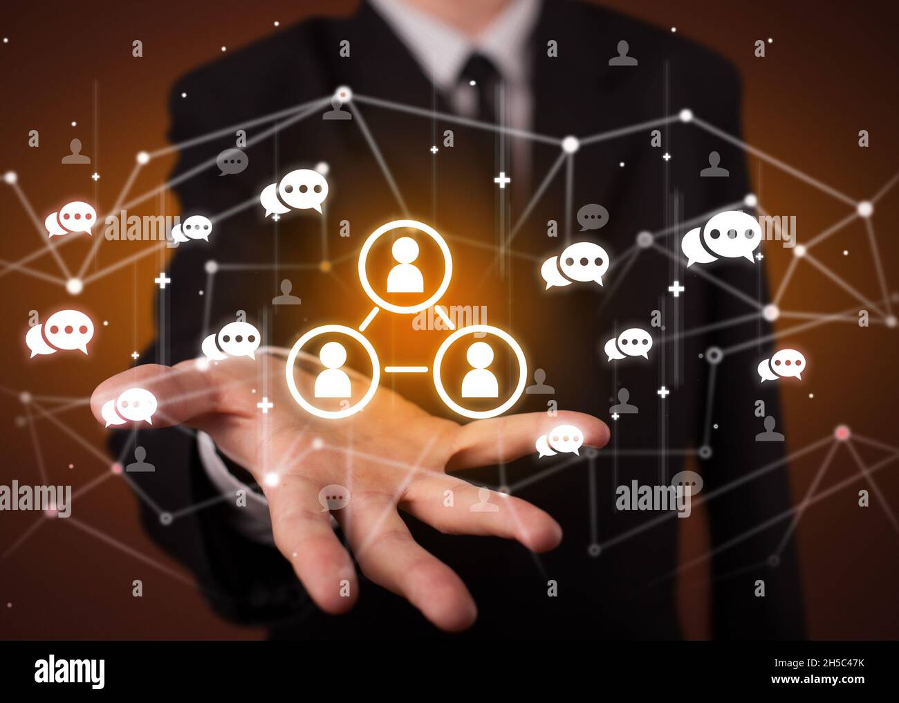 Hand holding social media icons Stock Photo - Alamy