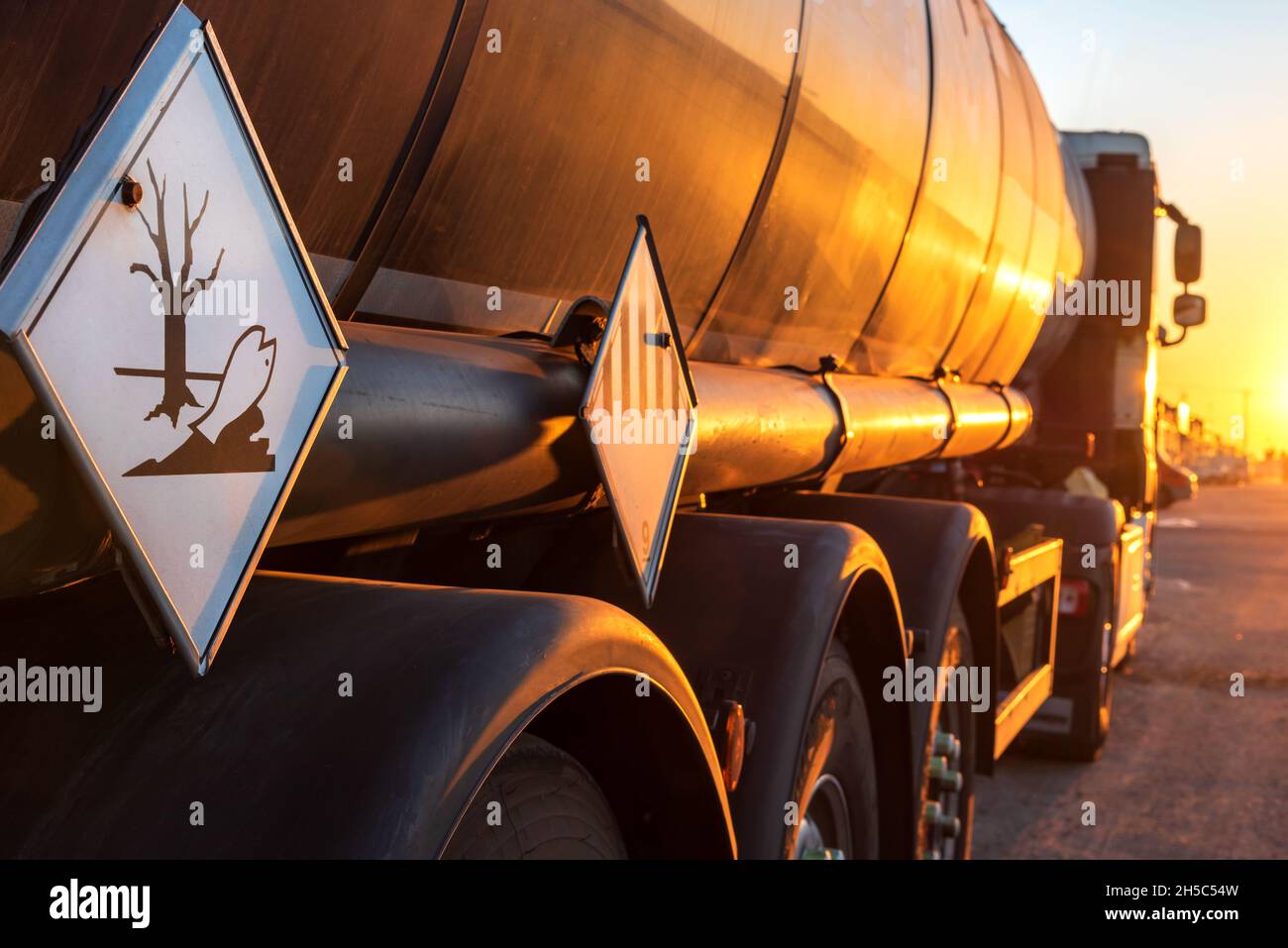 Contamination hazard labels on a tanker truck for the transport of ...