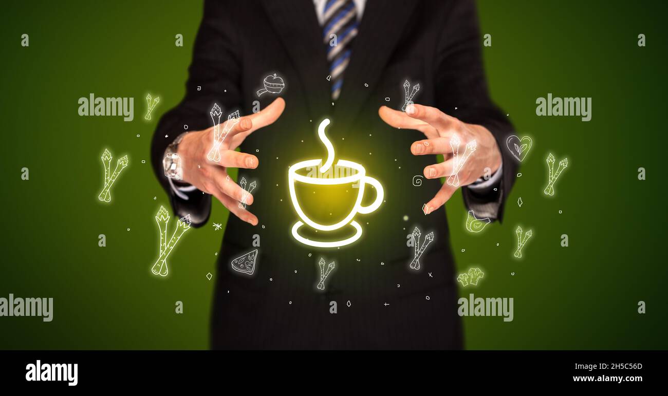 Hand holding food related icons Stock Photo - Alamy