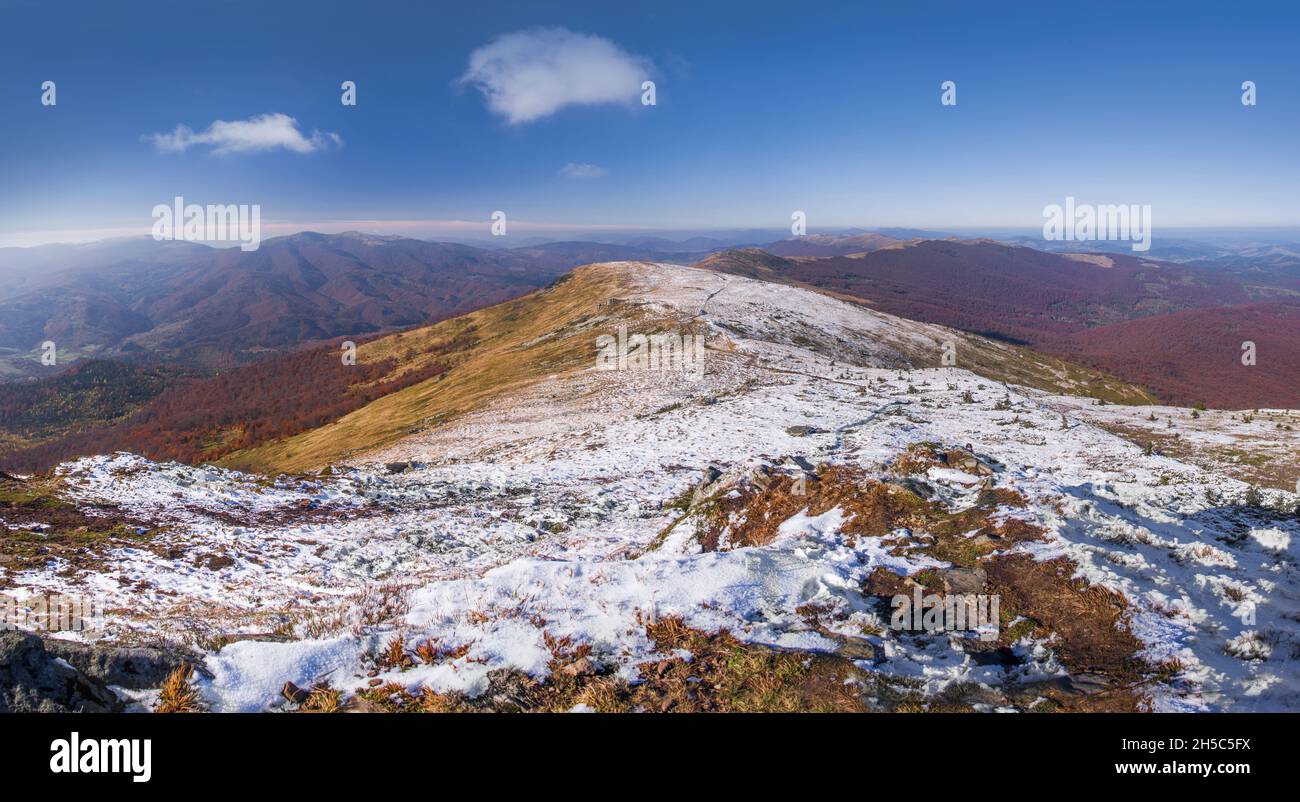 Panoramic view of hills of vast Water Dividing ridge covered in red ...