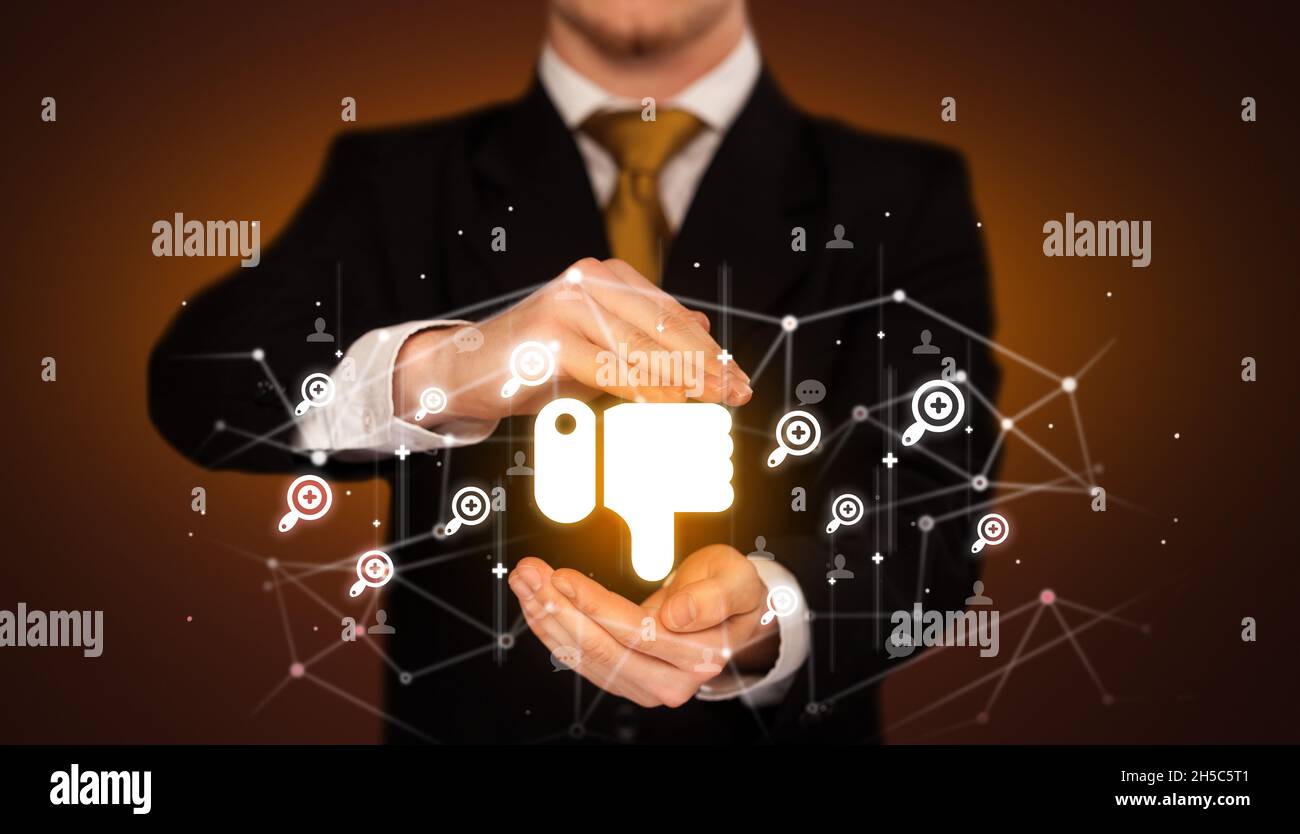 Hand holding social media icons Stock Photo - Alamy