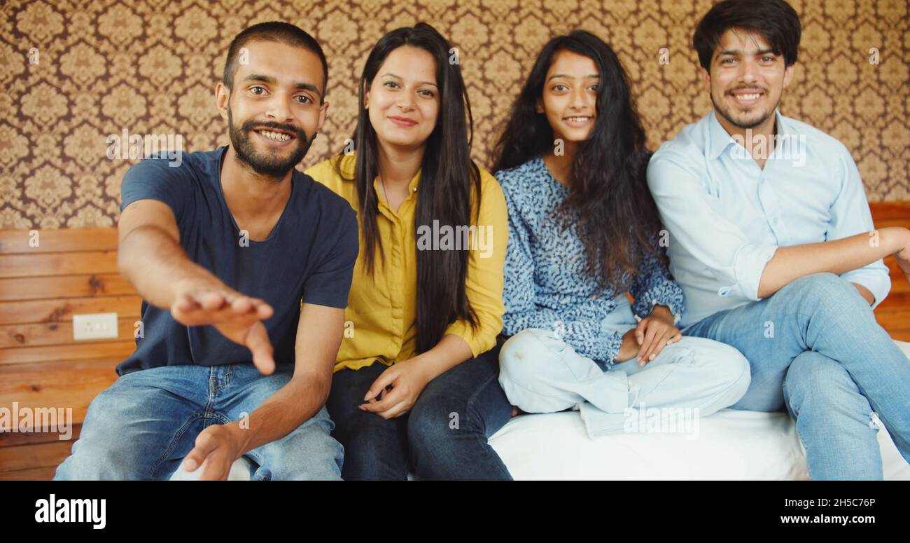 Group of south Asian friends sitting and talking, having fun Stock ...