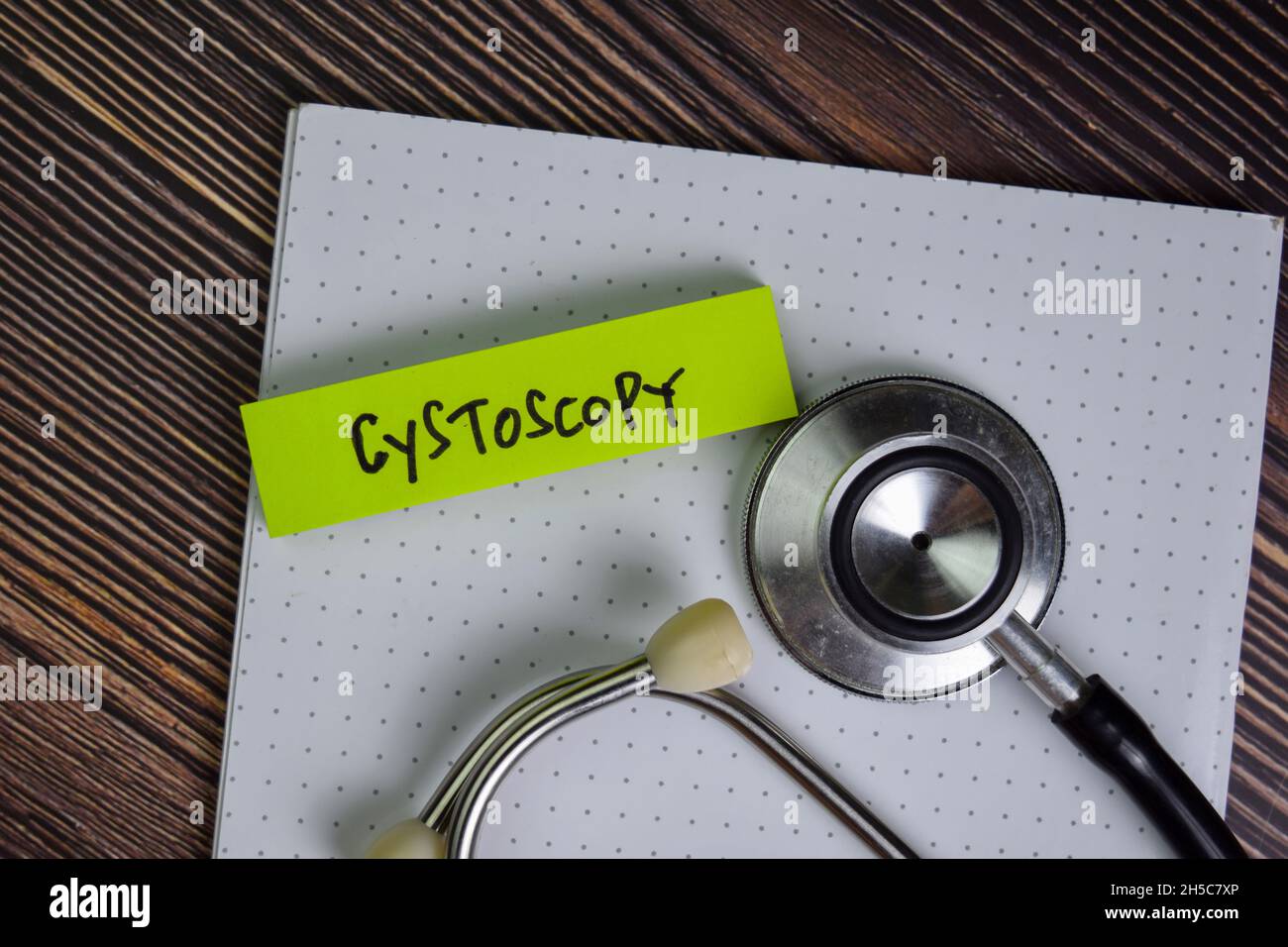 Cystoscopy write on sticky notes isolated on Wooden Table Stock Photo ...