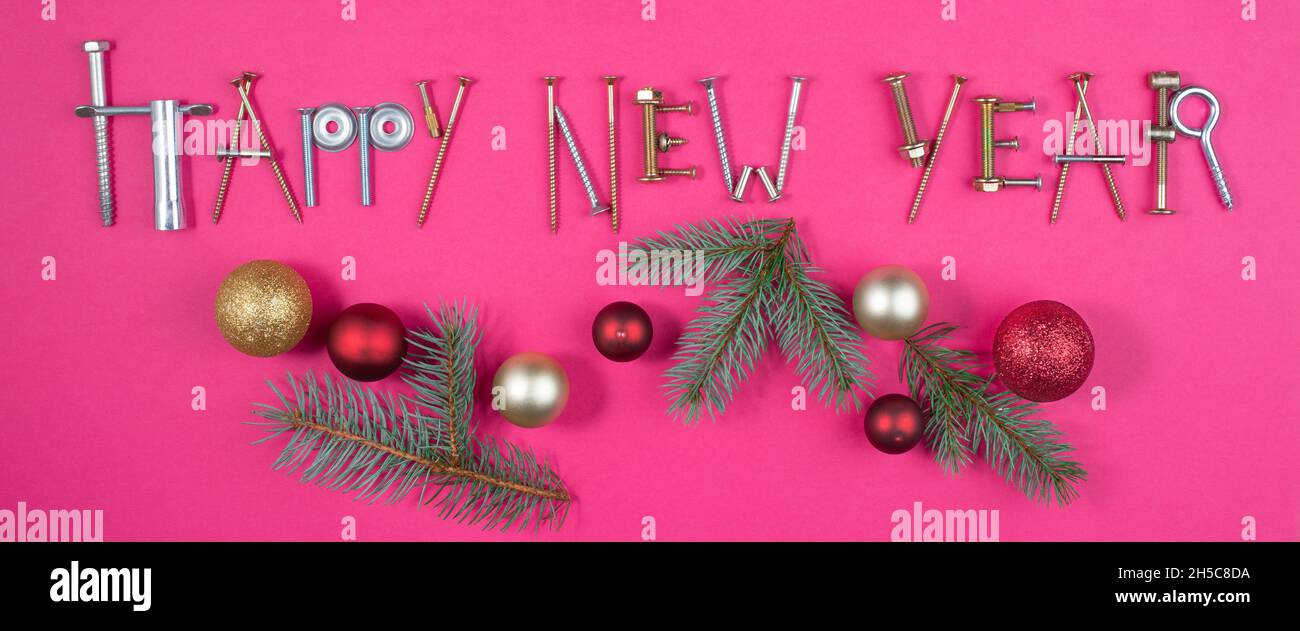 Words Happy New Year written with nails and screws. Wide banner Stock ...