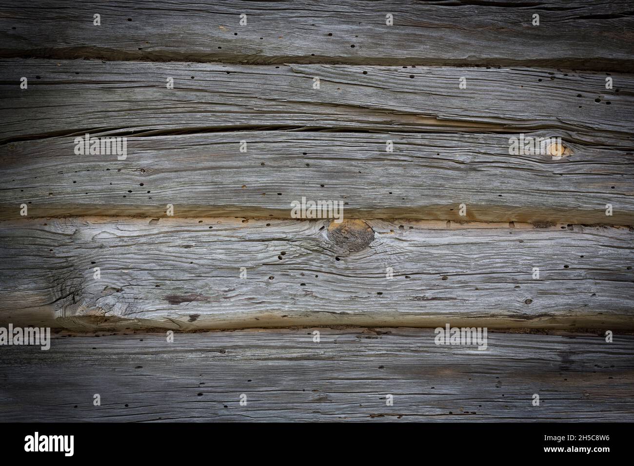 Wooden logs of an old house. Close-up. Weathered natural gray wood ...