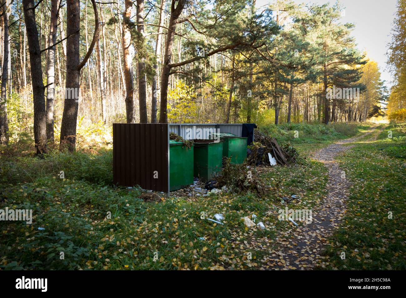 Greenery metal containers for collecting garbage in the forest. Waste ...