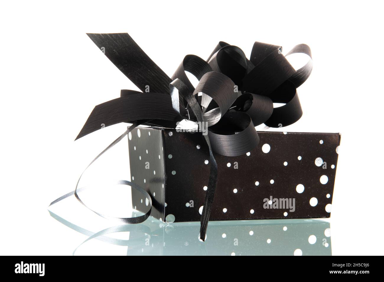 Luxury black present isolated over white background Stock Photo - Alamy