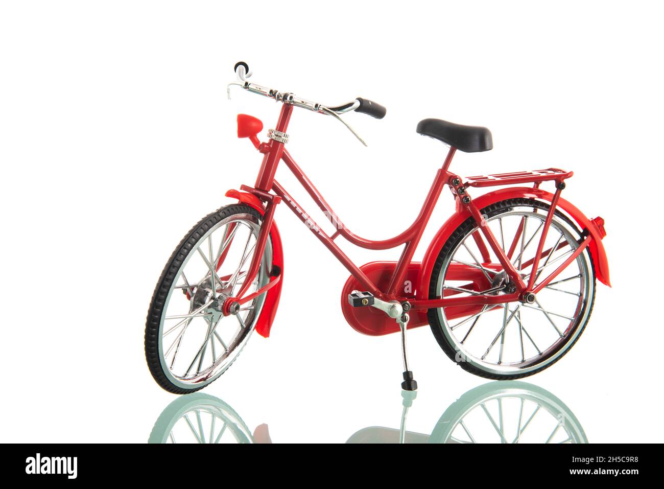 Red ladies bike isolated over white background Stock Photo - Alamy