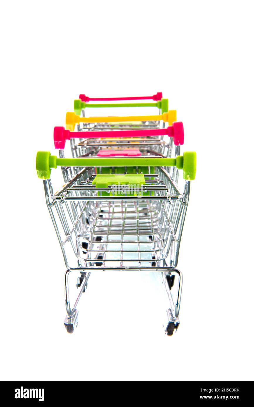 Row empty shopping carts isolated white background Stock Photo - Alamy