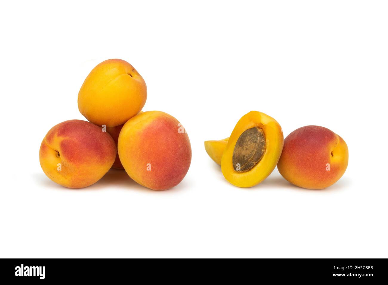 Whole and half fresh apricot on isolated white background Stock Photo ...