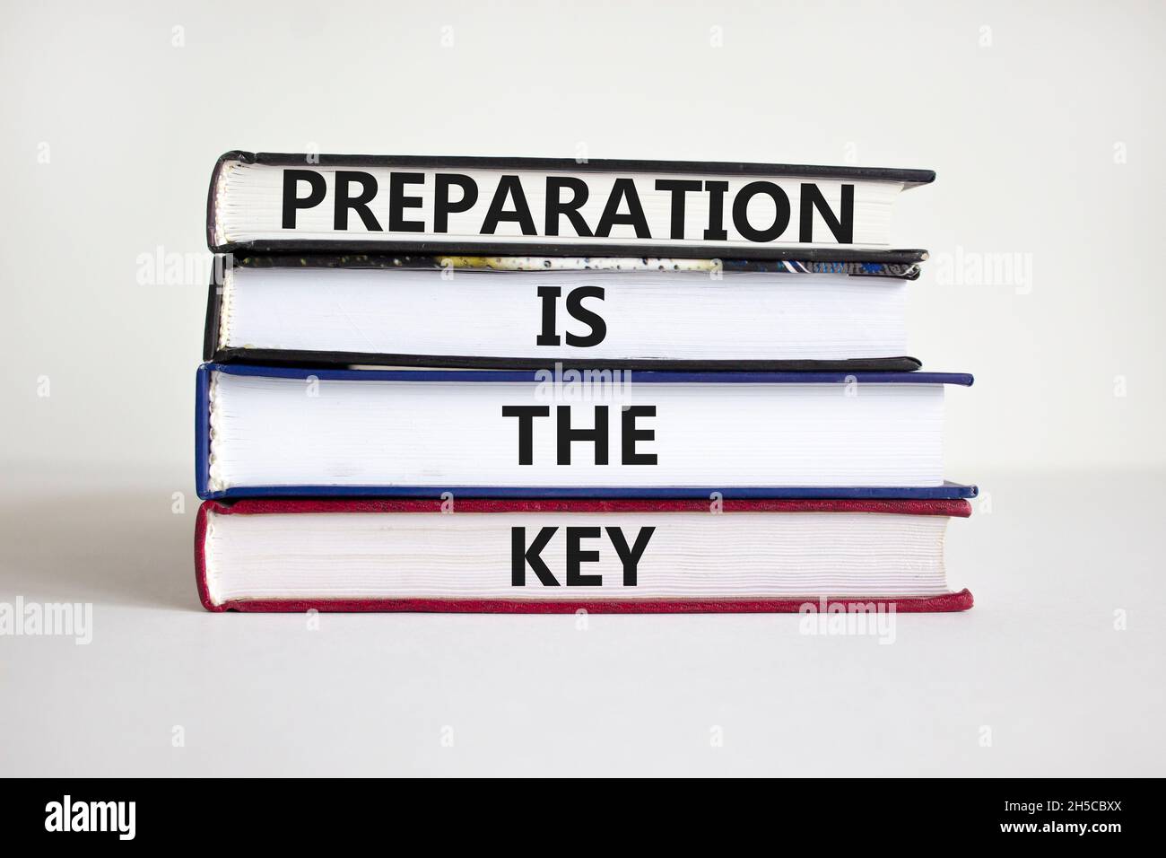Preparation is the key symbol. Books with words 'Preparation is the key ...