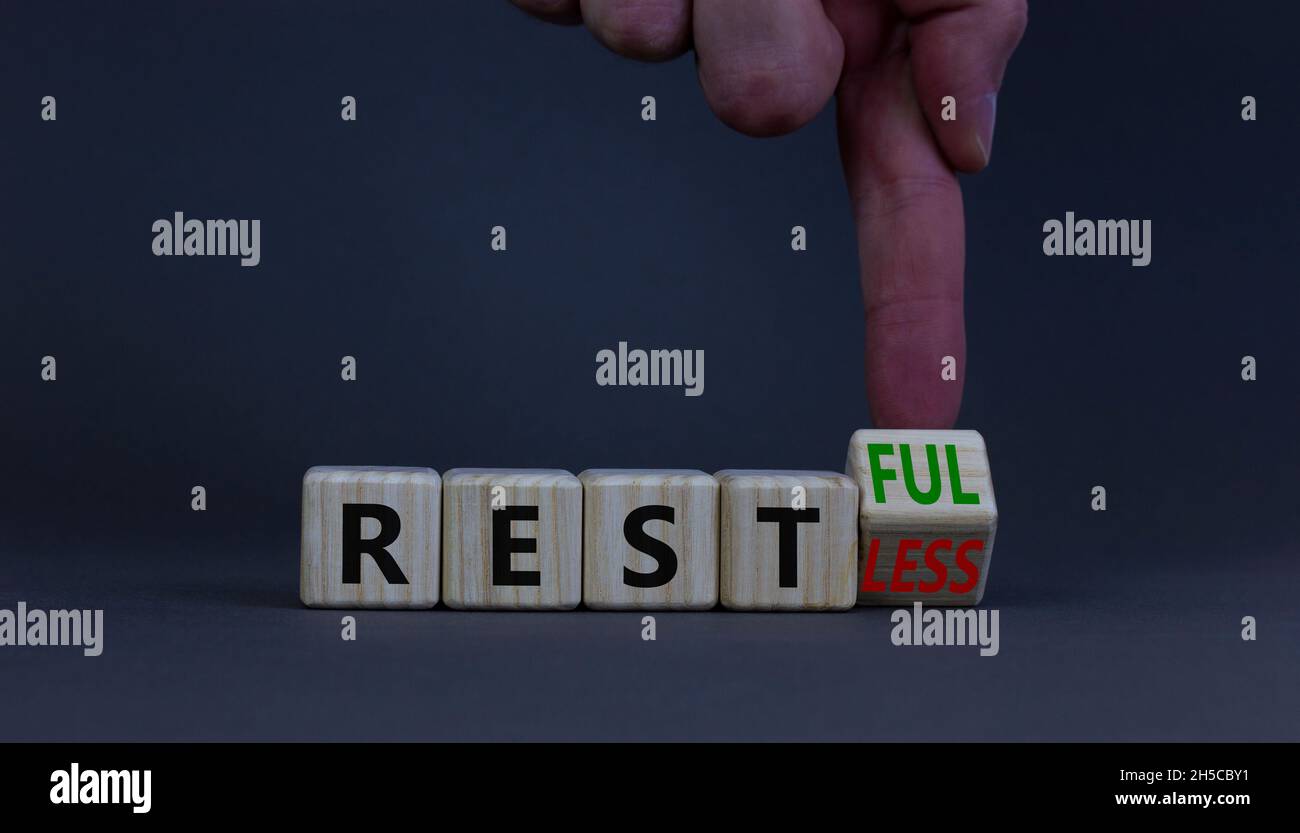 Restless or restful symbol. Doctor turns the wooden cube, changes the ...