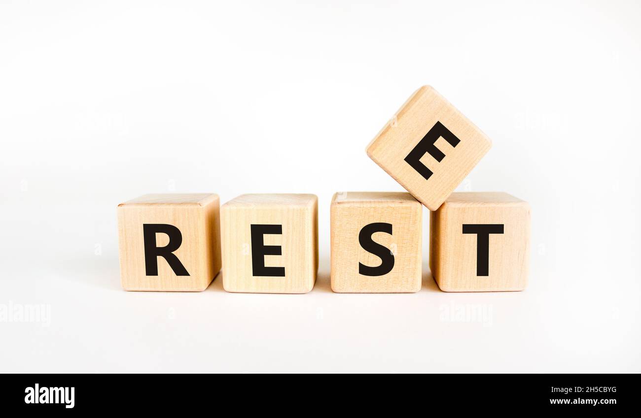 Reset symbol. The concept word 'reset' on wooden cubes. Beautiful white ...