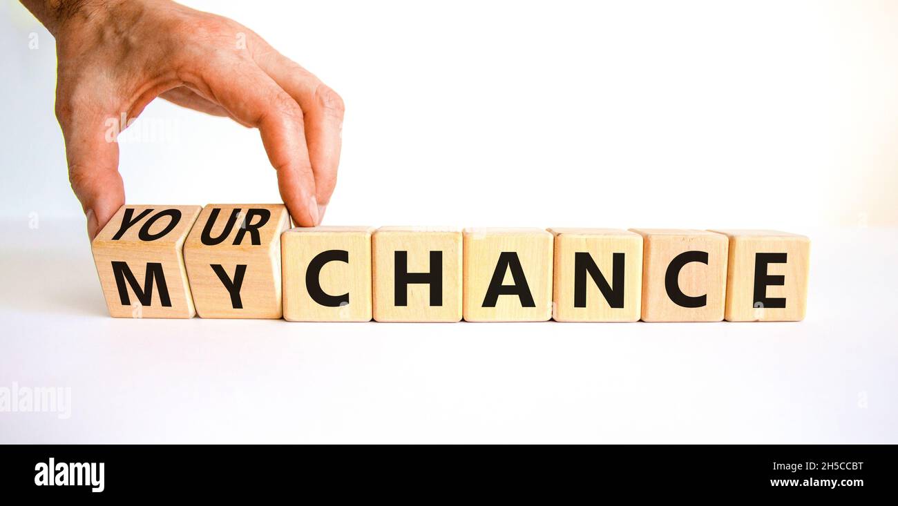 Your or my chance symbol. Businessman turns wooden cubes and changes ...