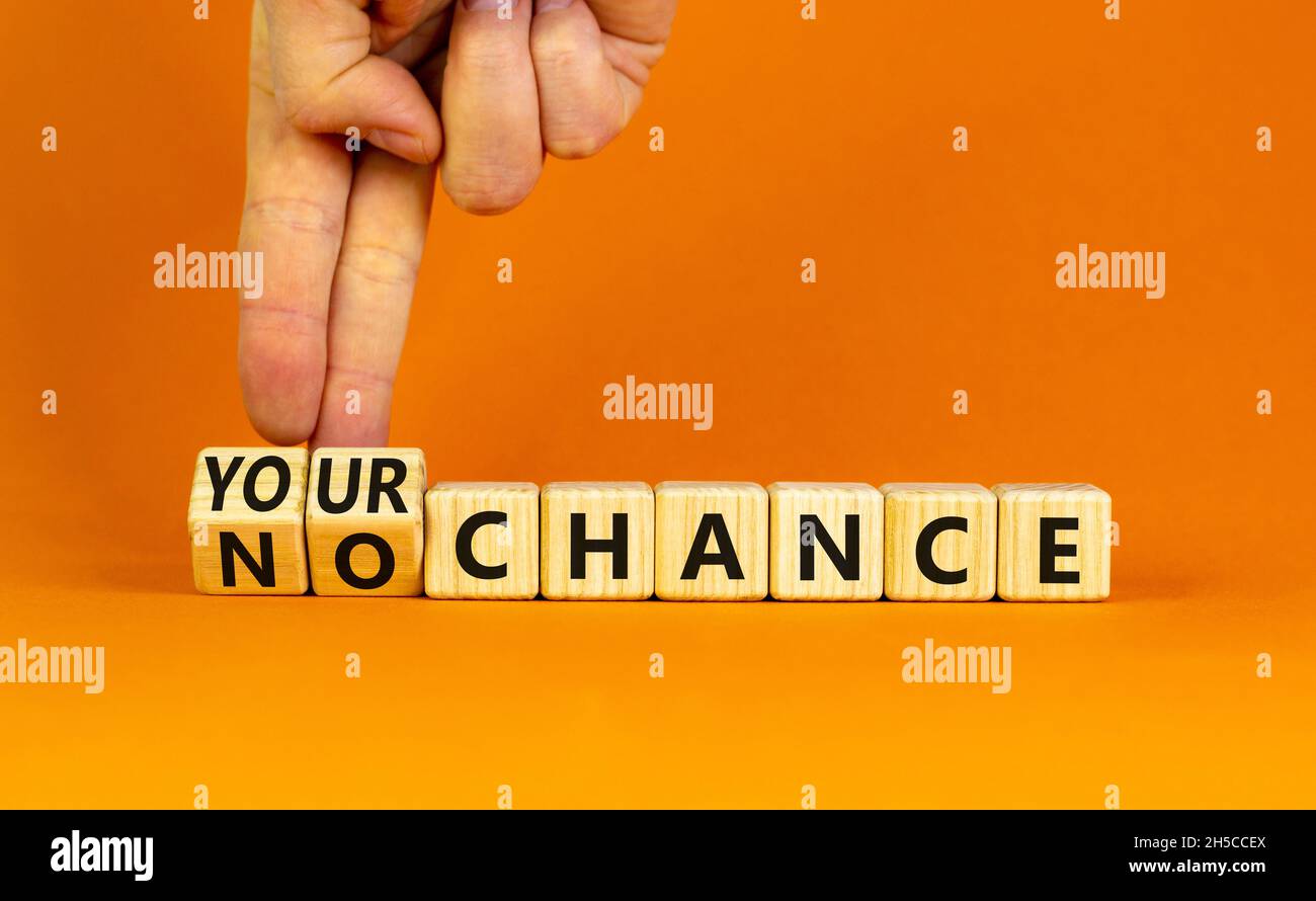 Your or my chance symbol. Businessman turns wooden cubes and changes ...
