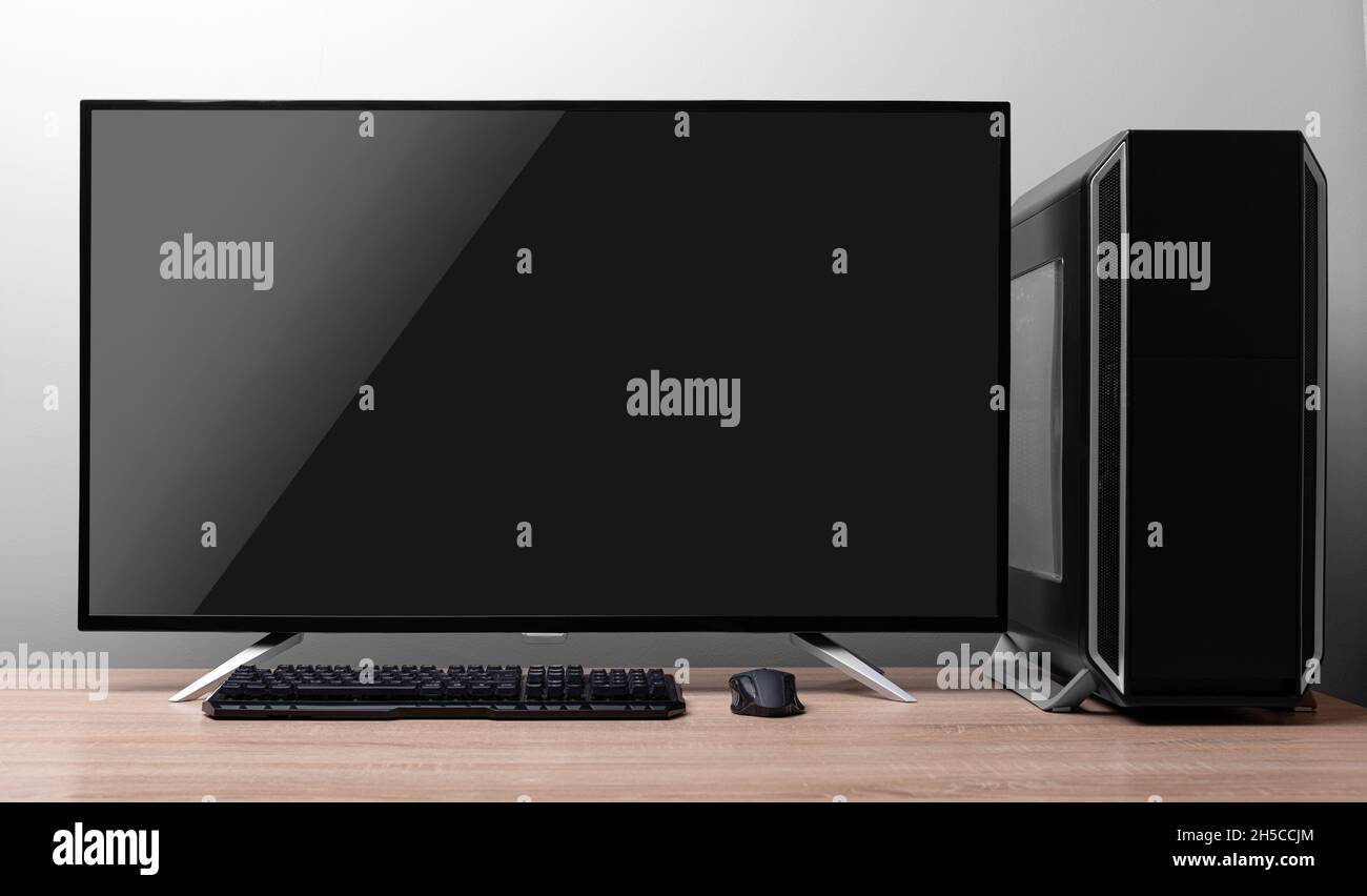 Workplace. Table with a desktop personal computer Stock Photo - Alamy