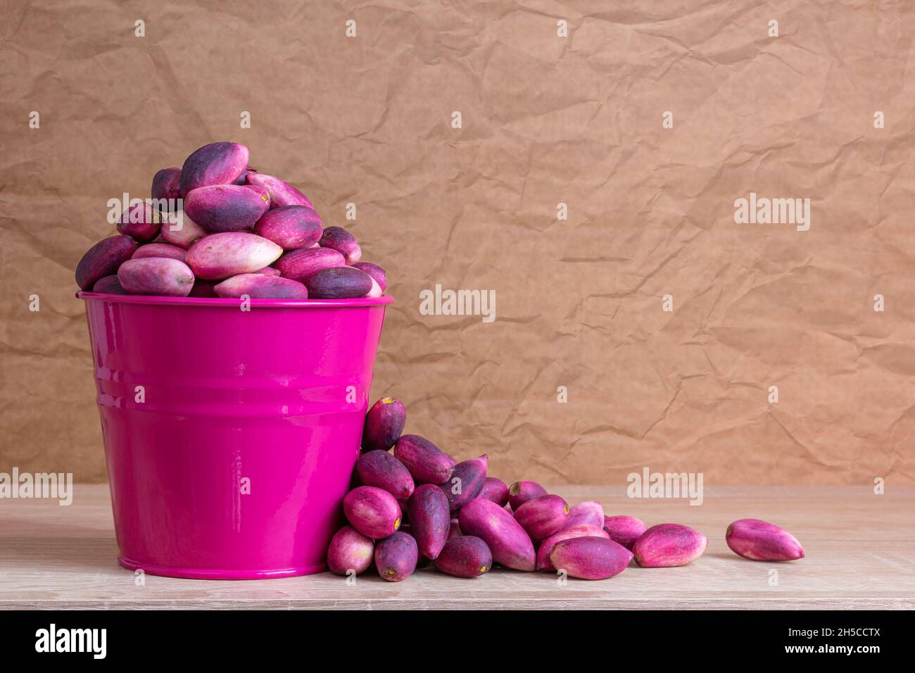 Freshly picked pistachios from the branch are in a small bucket Stock ...