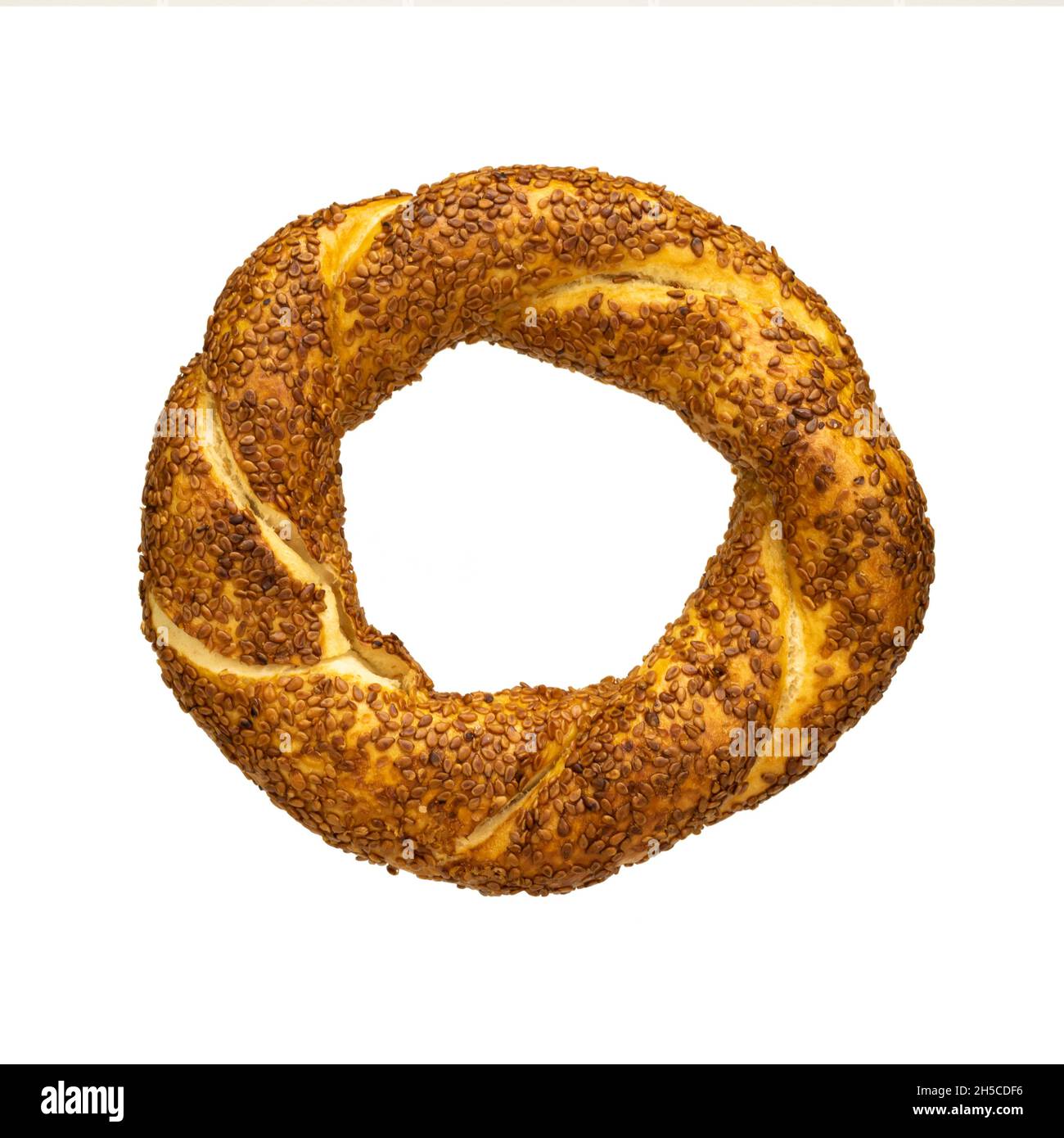 Traditional Turkish sesame bagel (simit) on isolated white background ...