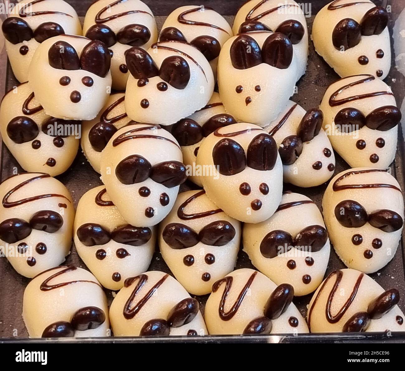 View of cute white mice from chocolate Stock Photo - Alamy