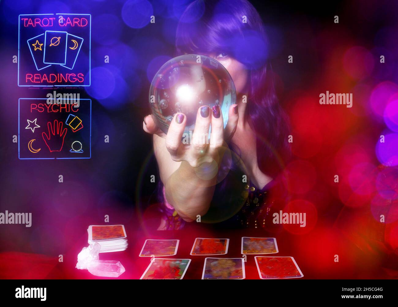 Psychic Tarot Card Reader With Vintage Neon Signs Stock Photo - Alamy
