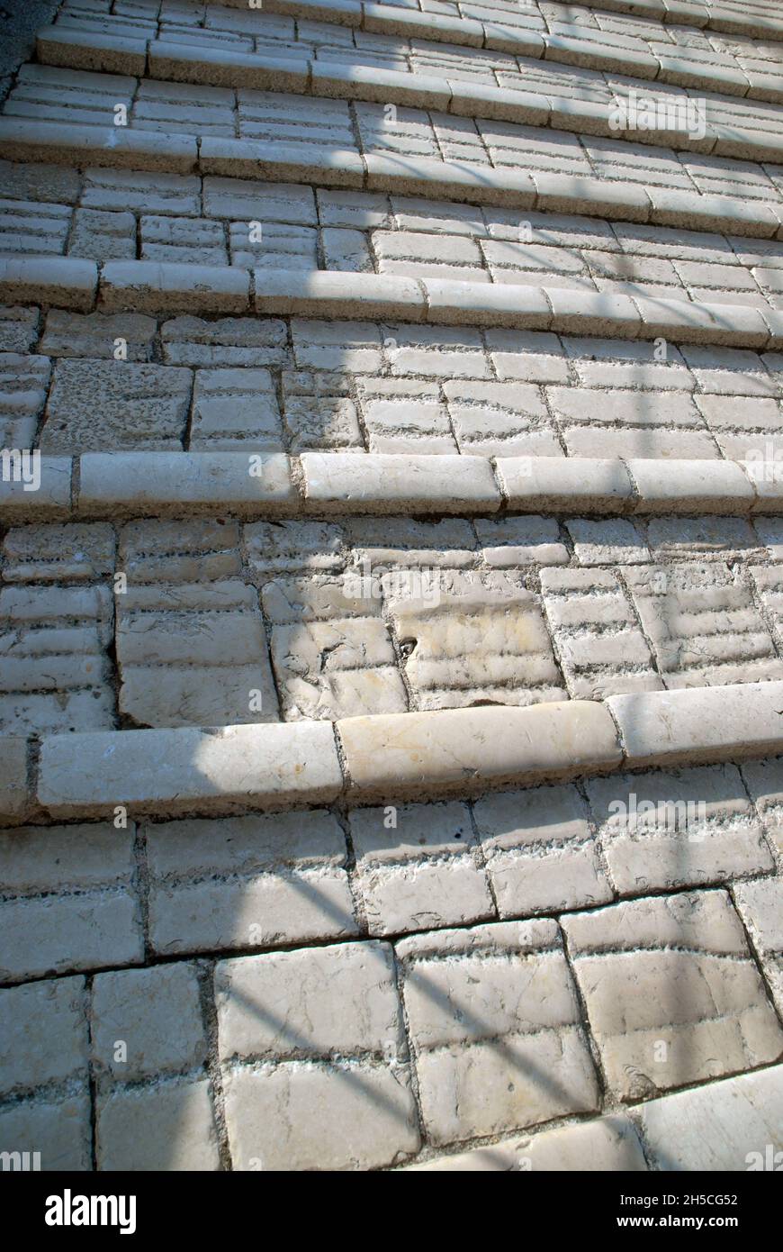 Worn steps of The Old Bridge, River Neretva, Mostar, Bosnia and ...