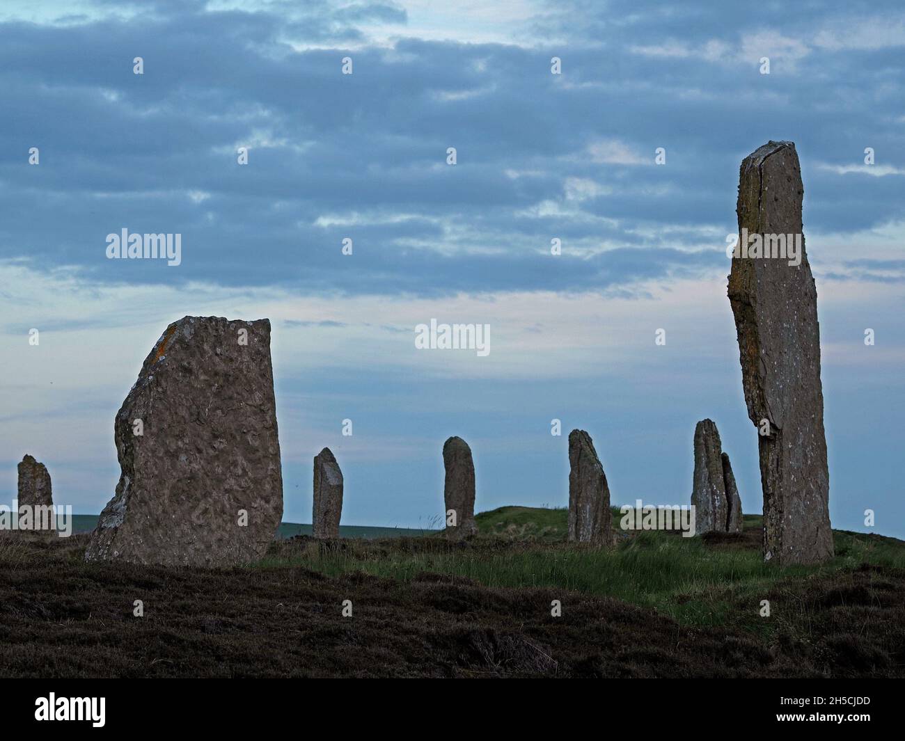 massive upright standing stones at dusk in the 21 stone circle known as ...
