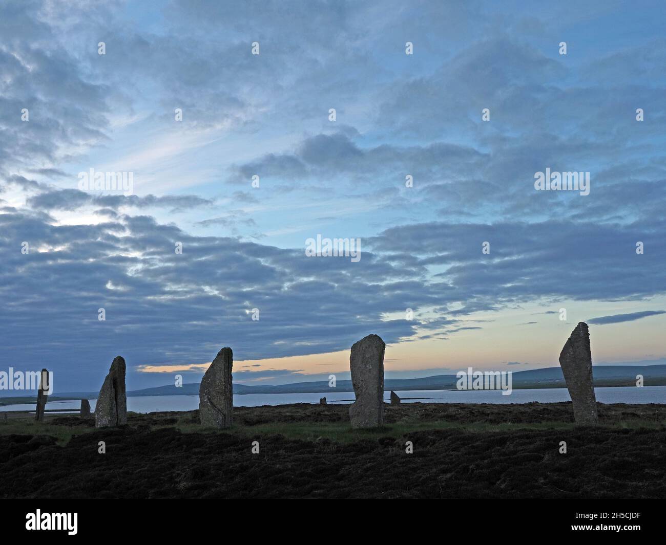 massive upright standing stones at dusk in the 21 stone circle known as ...