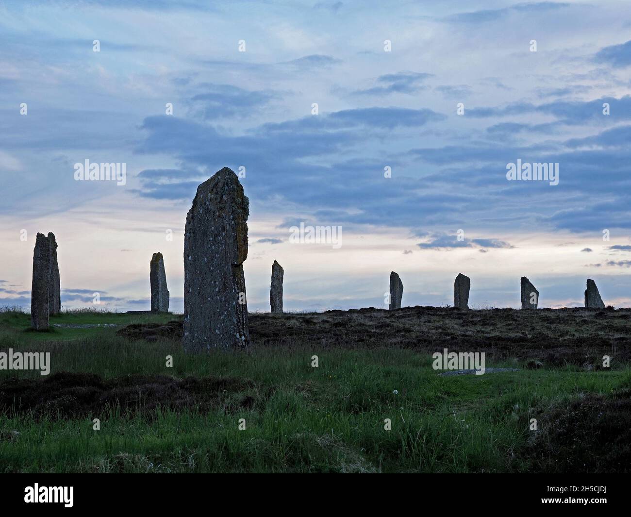 massive upright standing stones at dusk in the 21 stone circle known as ...