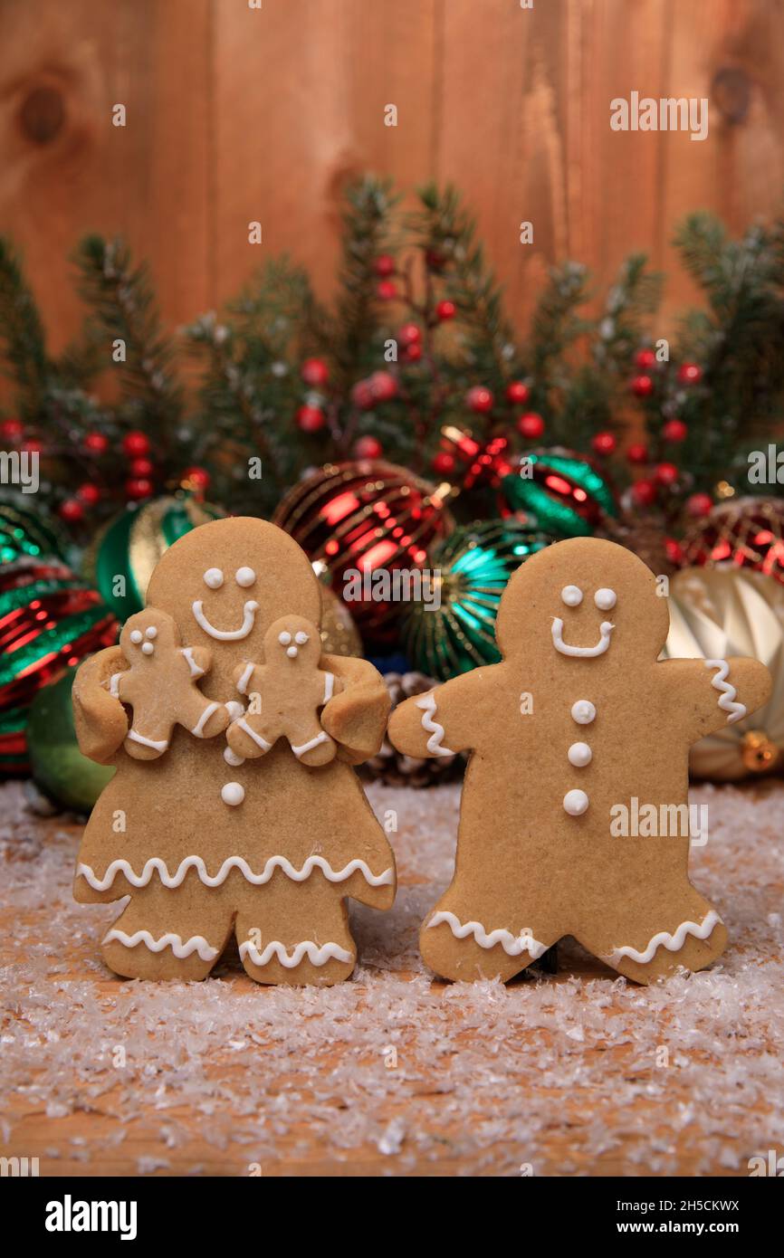 Gingerbread Family of 2 kids on Holiday Christmas Background Stock ...