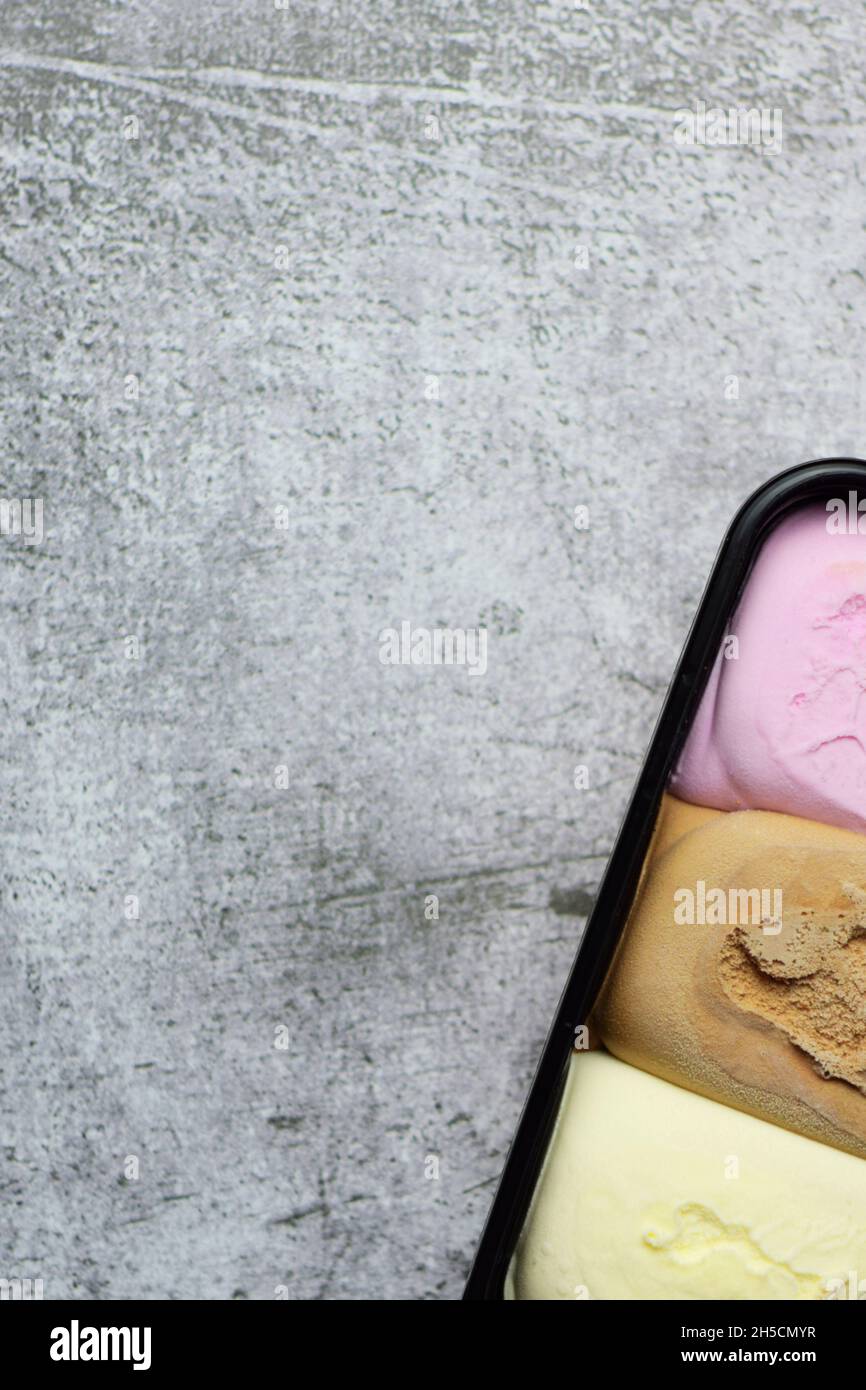 Top view of a table with different ice cream in a container Stock Photo ...